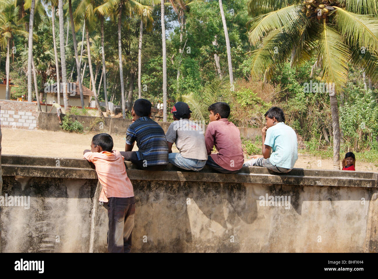 Village Boys Watching Games in the Open Village Play Ground by sitting ...