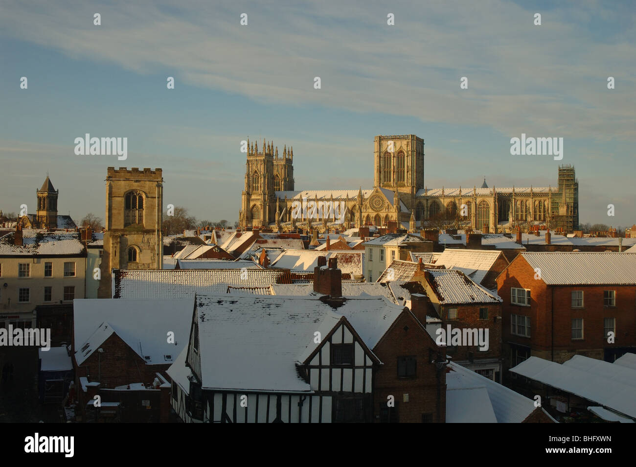 view of York Minster across the rooftops in winter, York, Yorkshire ...
