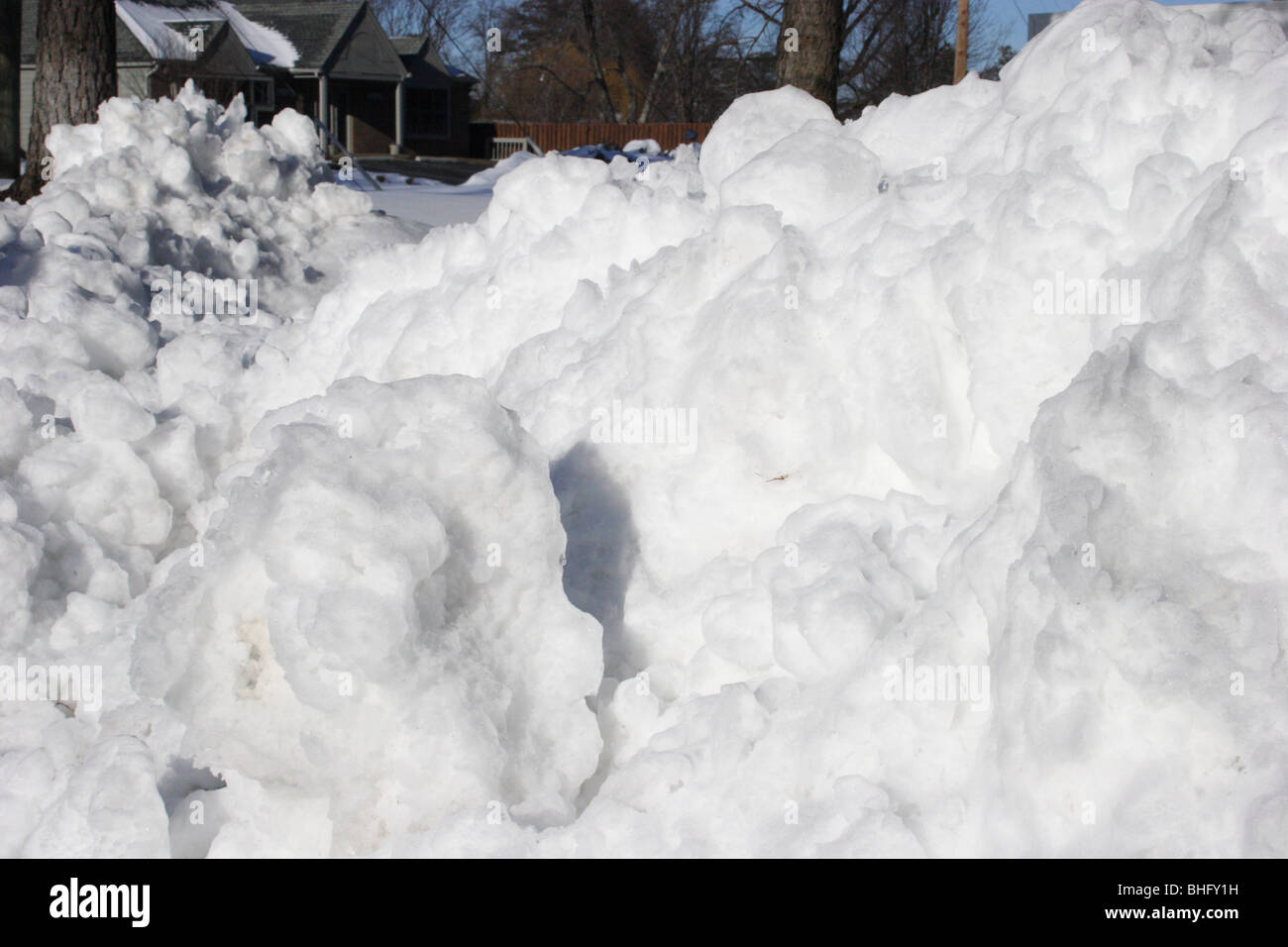 Snow embankment in parking lot Stock Photo - Alamy