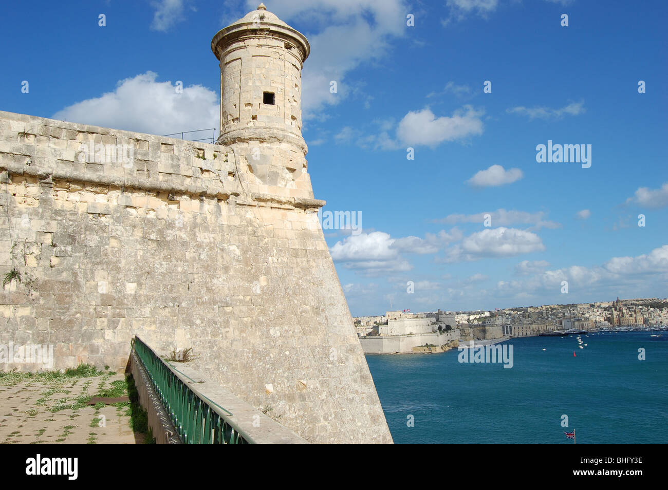 Malta's defense wall and watch tower look out towards the Mediterranean ...