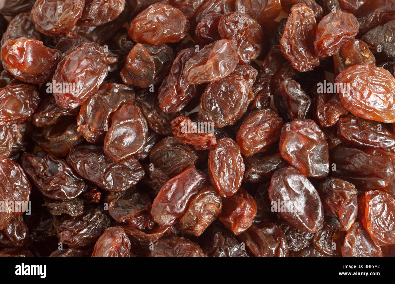 A background of dark raisins shot close up Stock Photo - Alamy