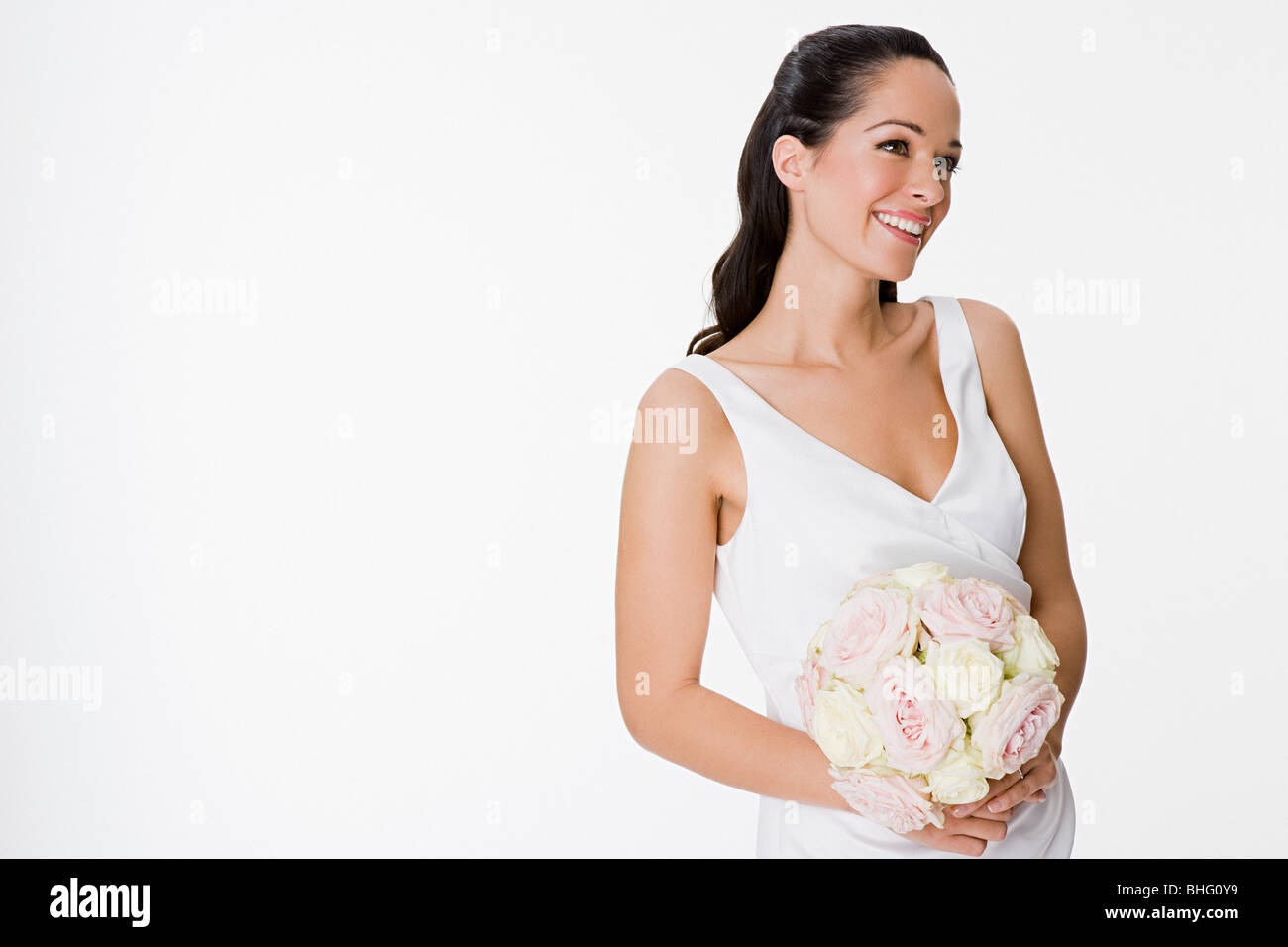 Bride holding a bouquet Stock Photo - Alamy
