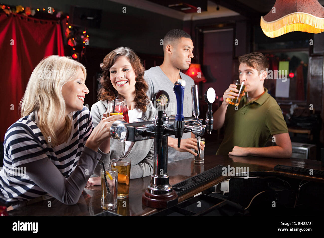 Ethnic mix in bar hi-res stock photography and images - Alamy