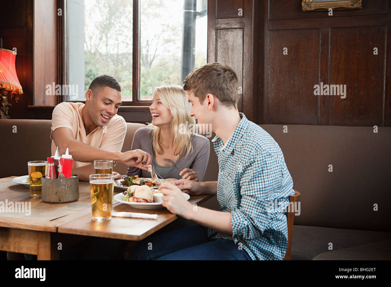 Friends in bar Stock Photo - Alamy
