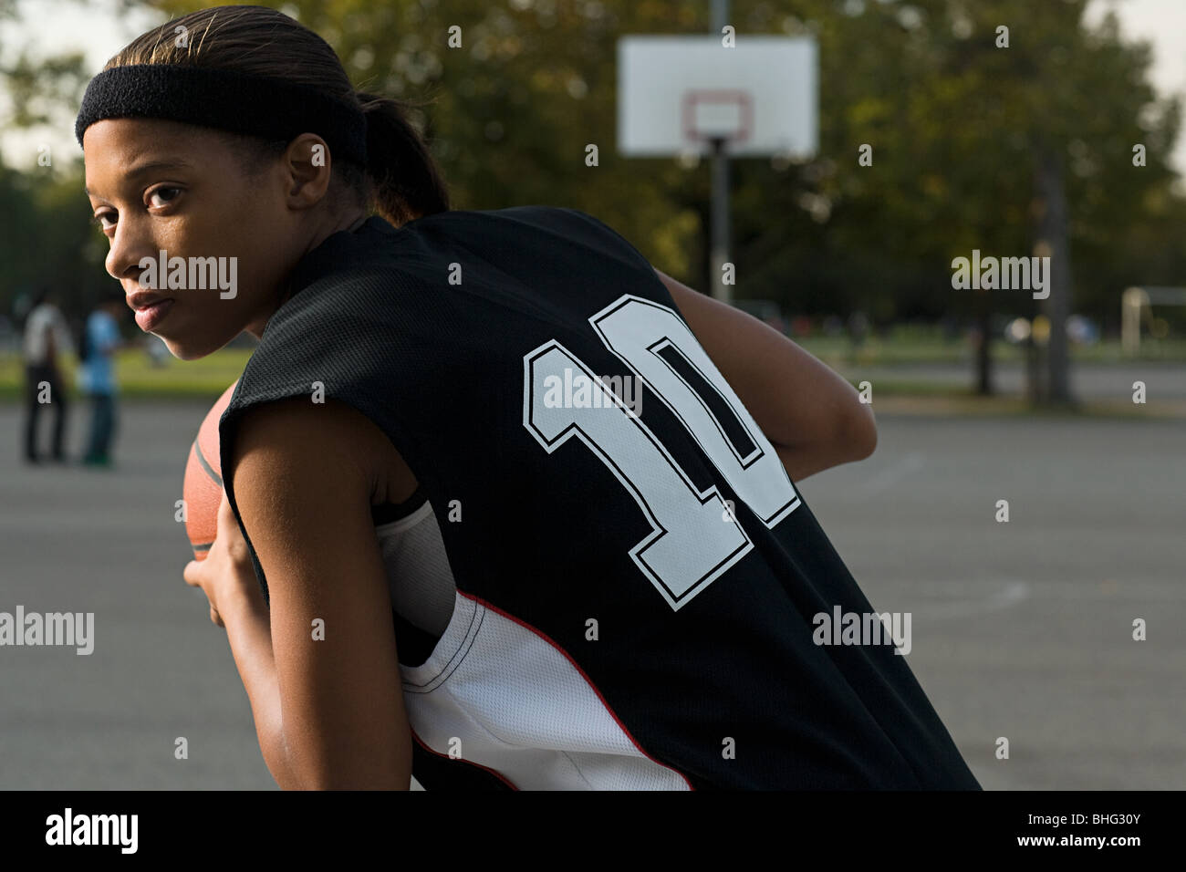 Female basketball player in uniform hi-res stock photography and images ...