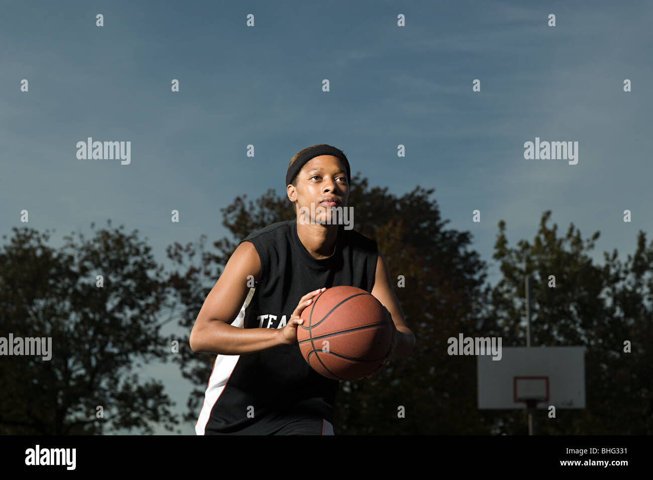 Female Basketball Player Looking Up