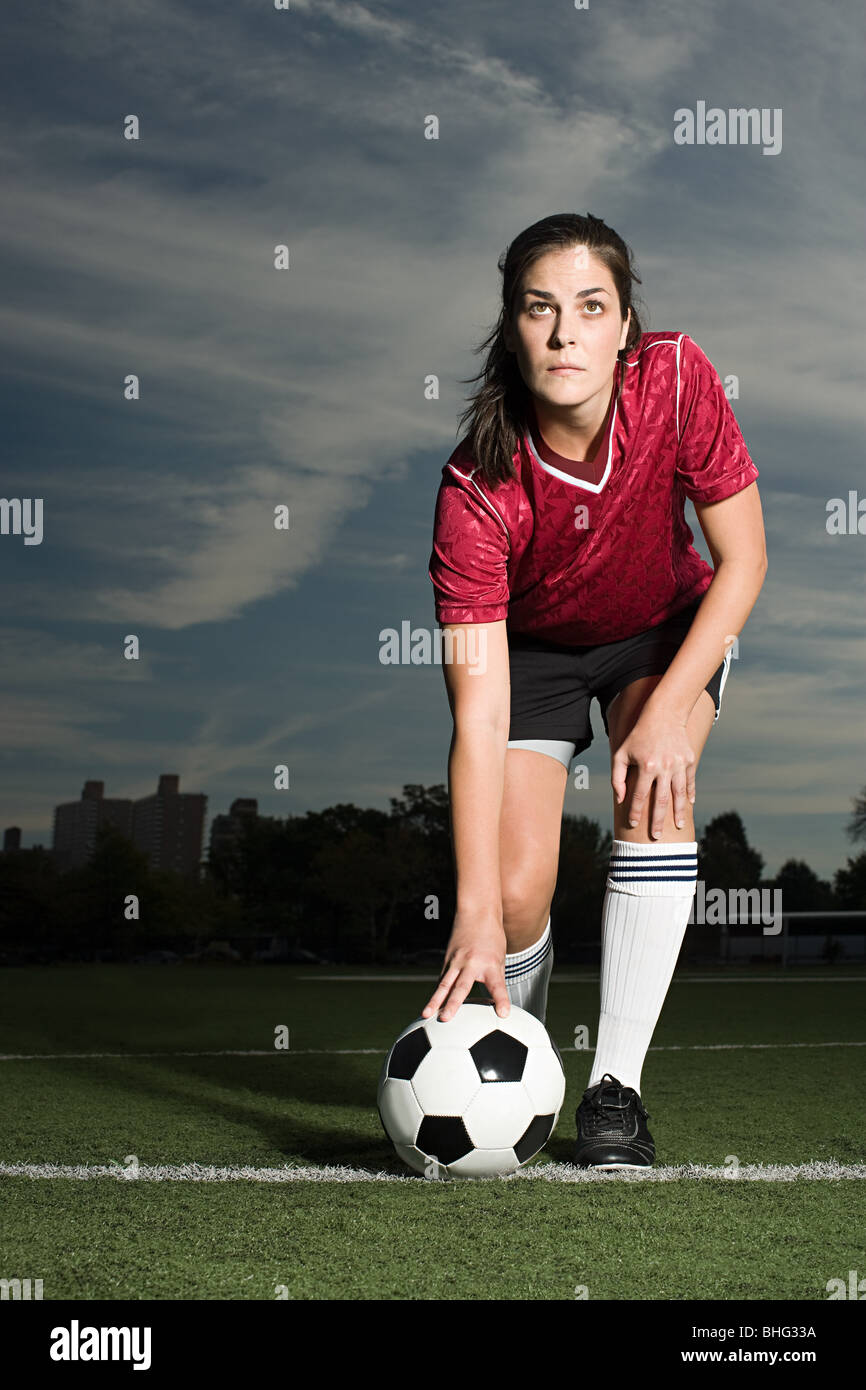 Football player with ball Stock Photo - Alamy