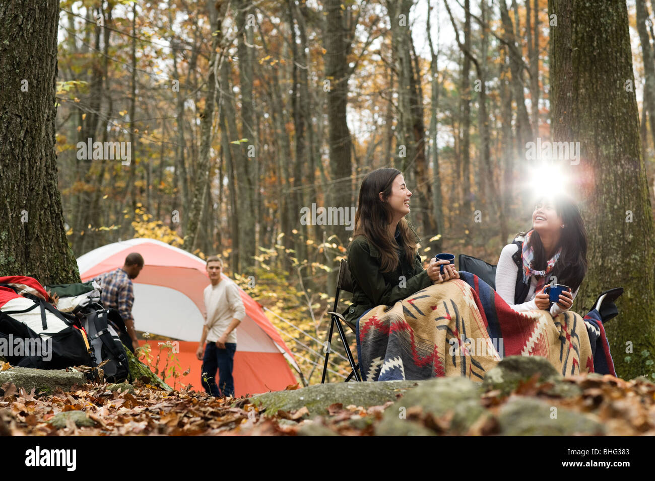 Friends at campsite Stock Photo - Alamy