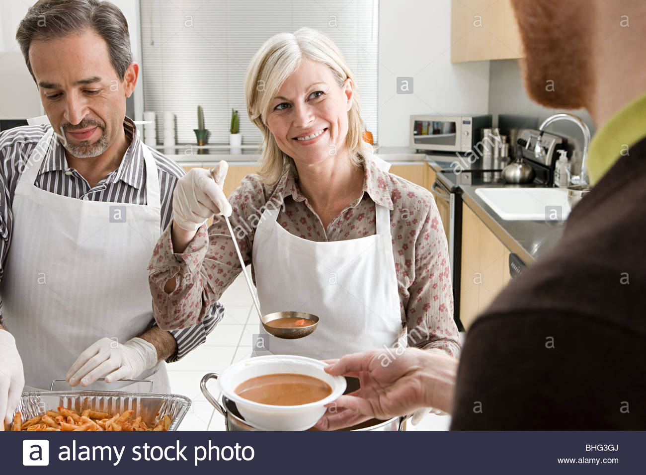 Soup Kitchen Volunteer Stock Photos & Soup Kitchen Volunteer Stock ...