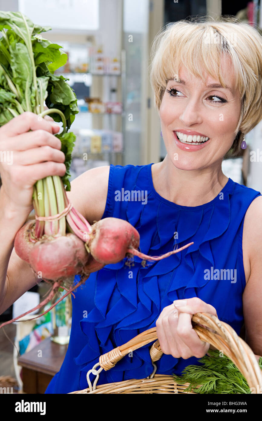 Woman with beetroot Stock Photo - Alamy