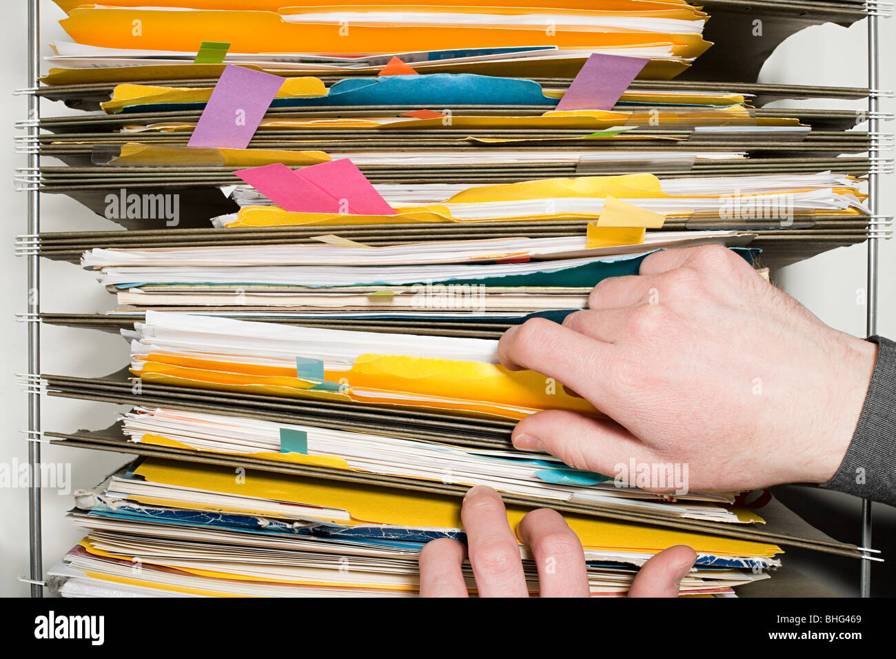 Person with files Stock Photo - Alamy