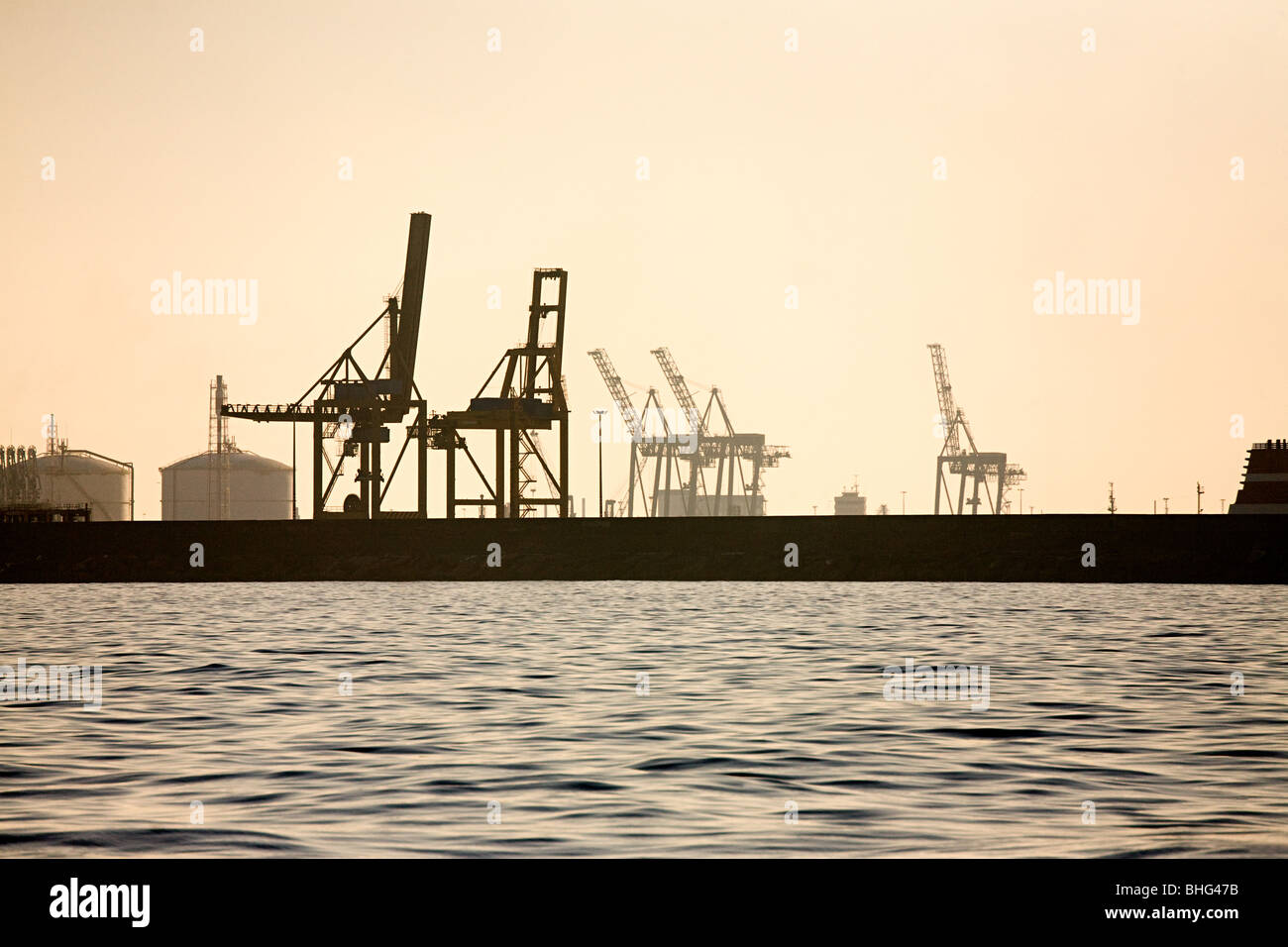 Loading cranes at harbour Stock Photo - Alamy