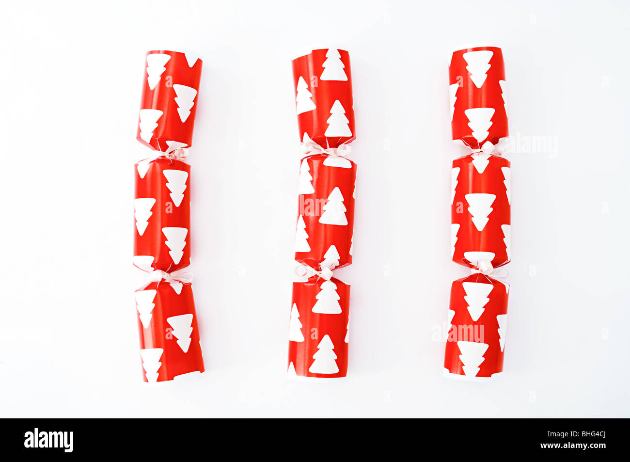 Three christmas crackers Stock Photo - Alamy