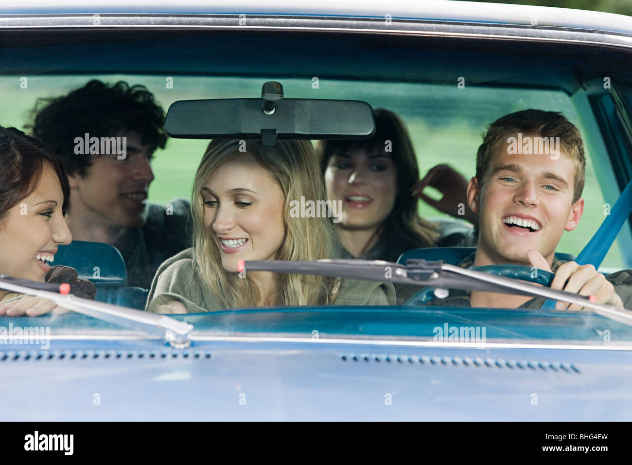 Friends in a car Stock Photo - Alamy