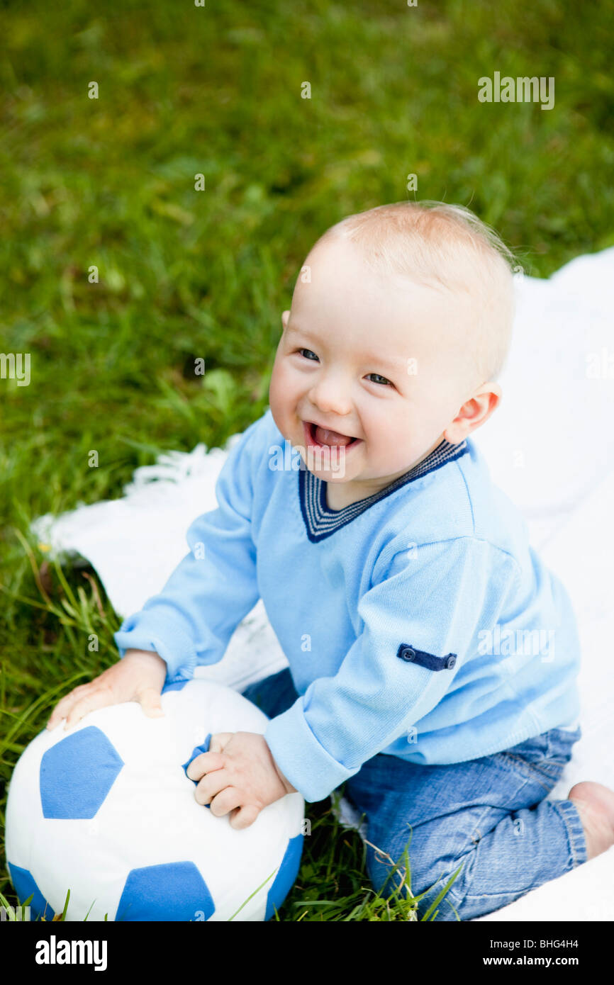 Cute baby playing football hi-res stock photography and images - Alamy
