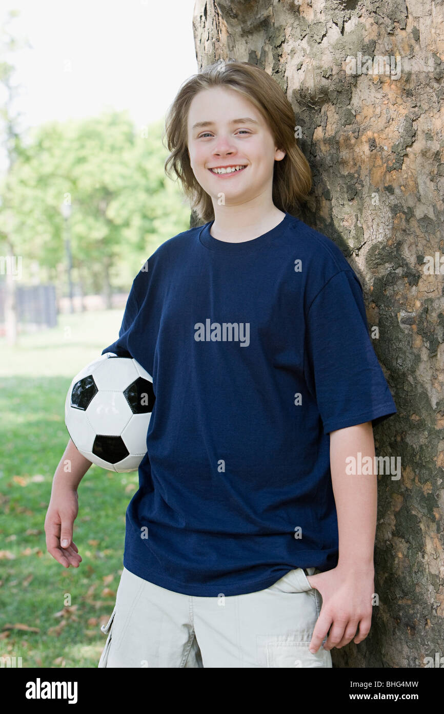 Boy with football Stock Photo - Alamy