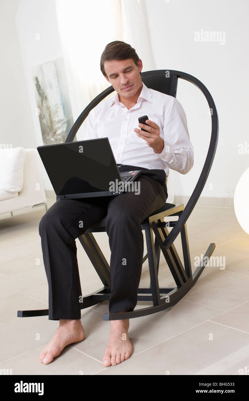 teleworking man in home office Stock Photo - Alamy