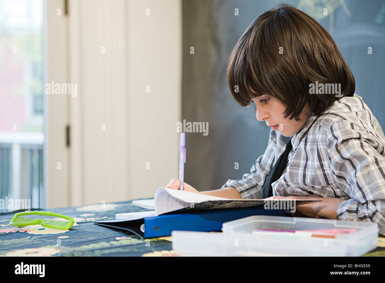 Boy 13 years doing homework hi-res stock photography and images - Alamy