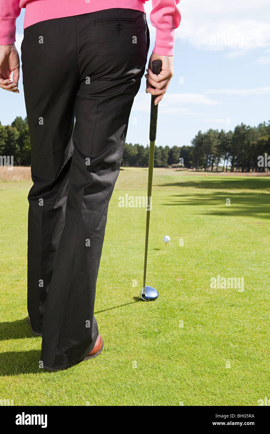 Rear view of a golfer Stock Photo - Alamy