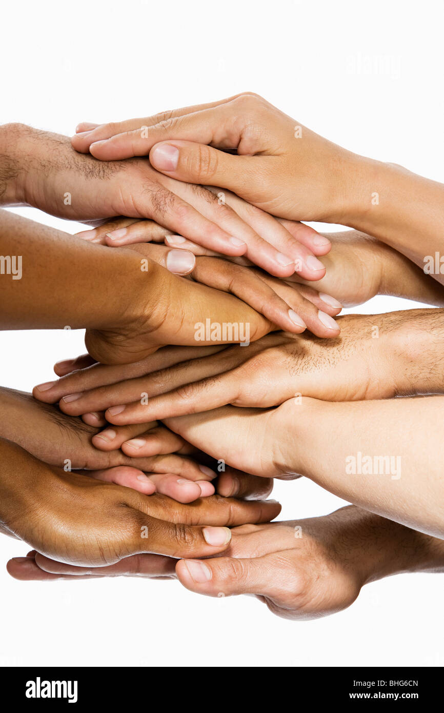 Hands on top of each other Stock Photo - Alamy