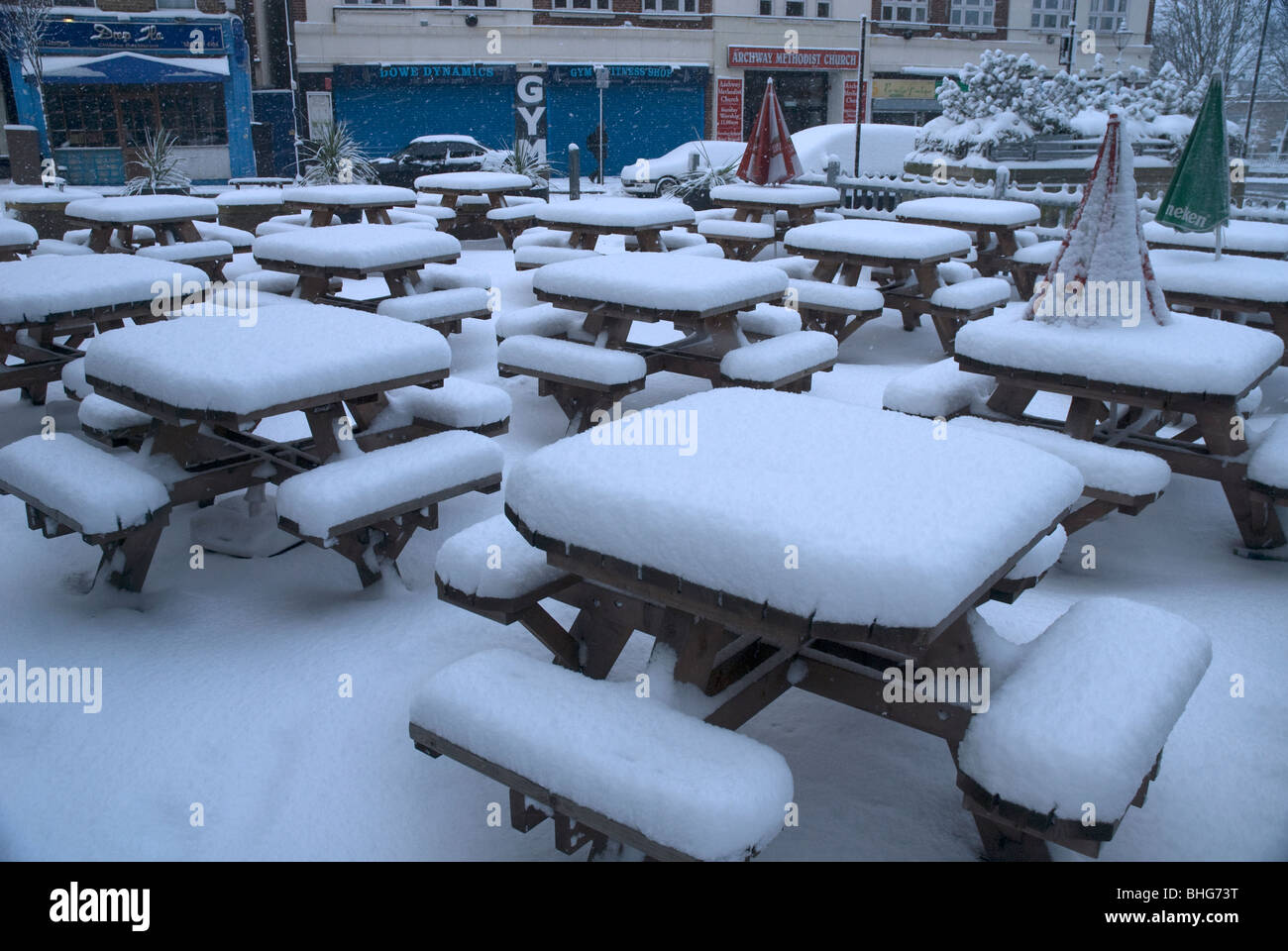 Snow covered tables, Archway, London, UK Stock Photo - Alamy