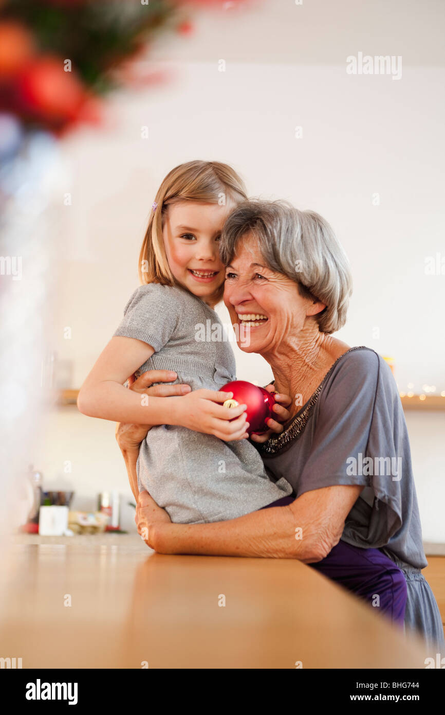 grandchild and grandma hugging Stock Photo - Alamy