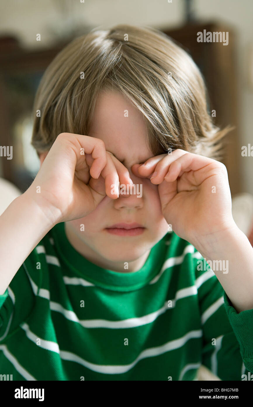 Crying boy face covered hi-res stock photography and images - Alamy