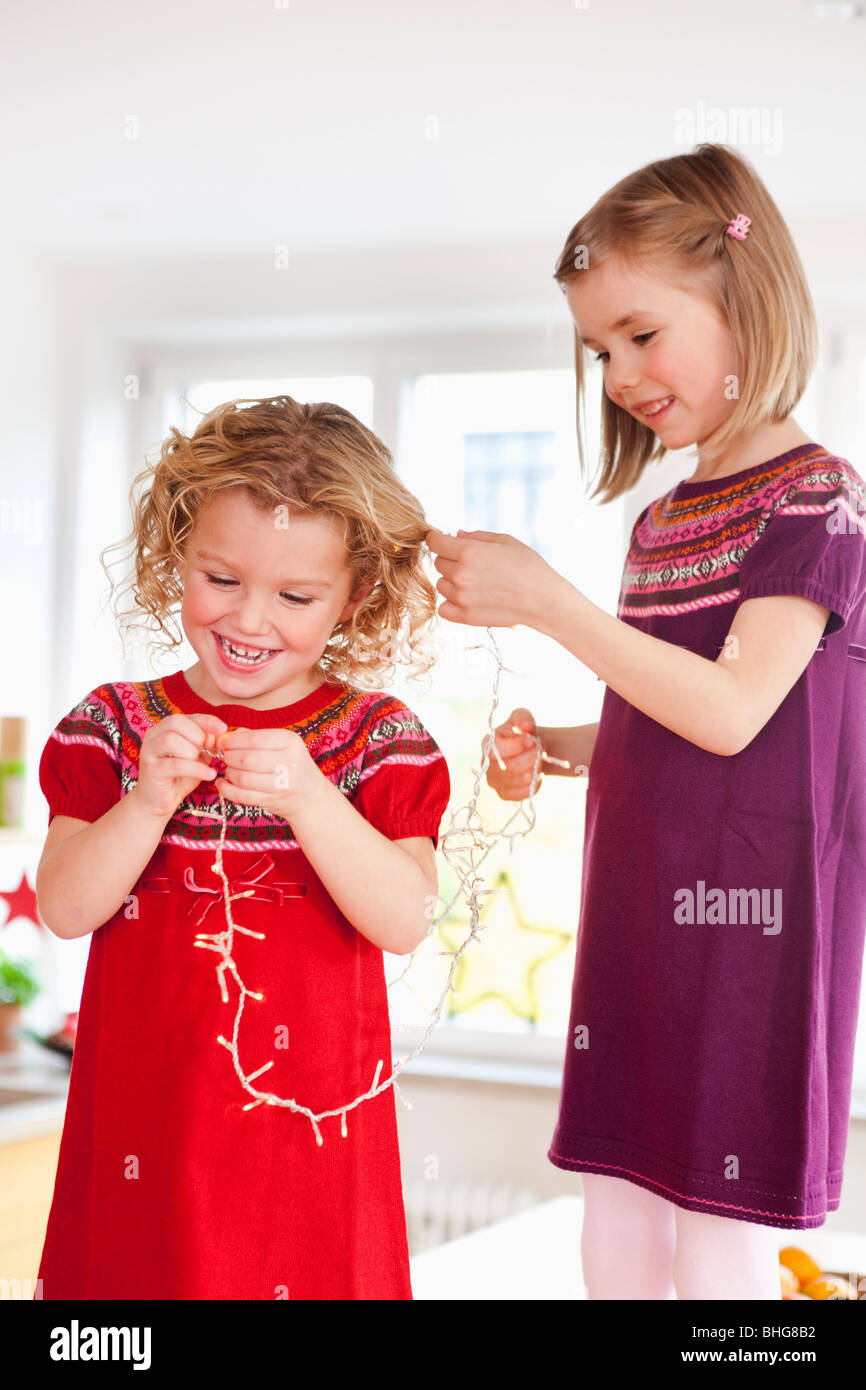 children playing with decoration lights Stock Photo - Alamy