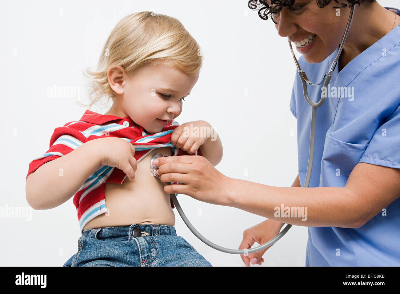 Toddler and nurse with stethoscope Stock Photo - Alamy