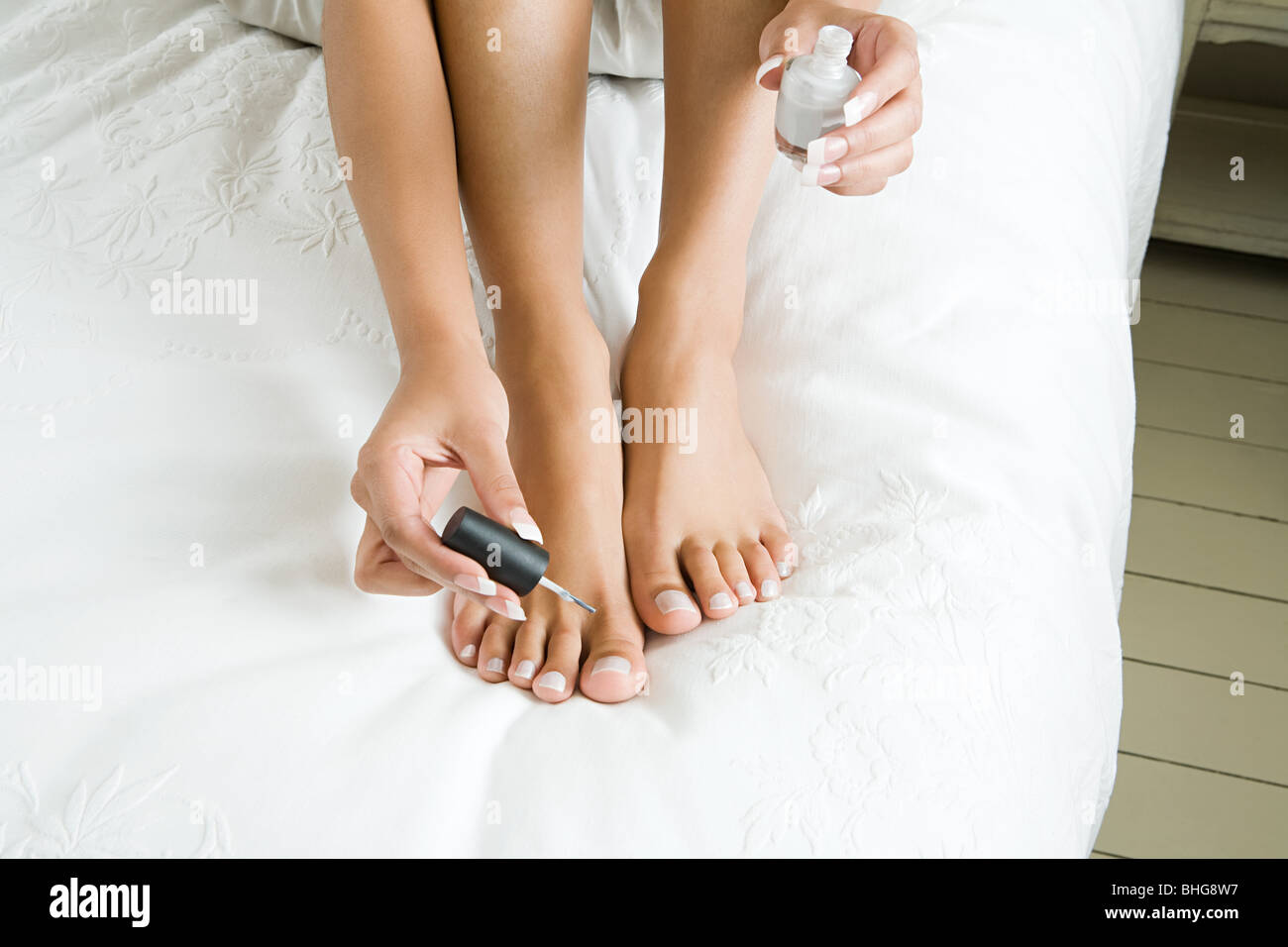 Women painting toenails hi-res stock photography and images - Alamy