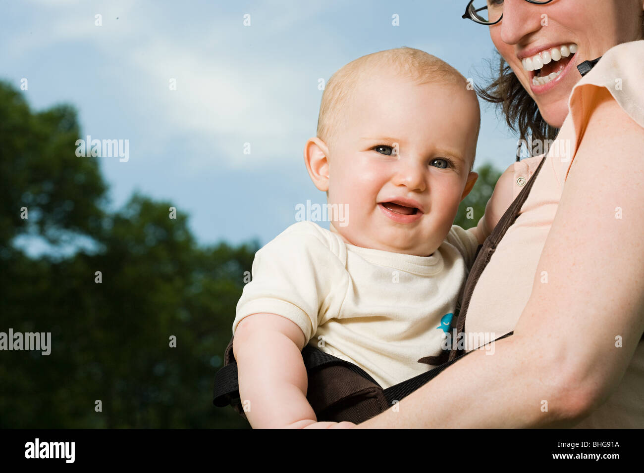 Mother carrying baby Stock Photo - Alamy Mother carrying baby Stock Photo - Alamy