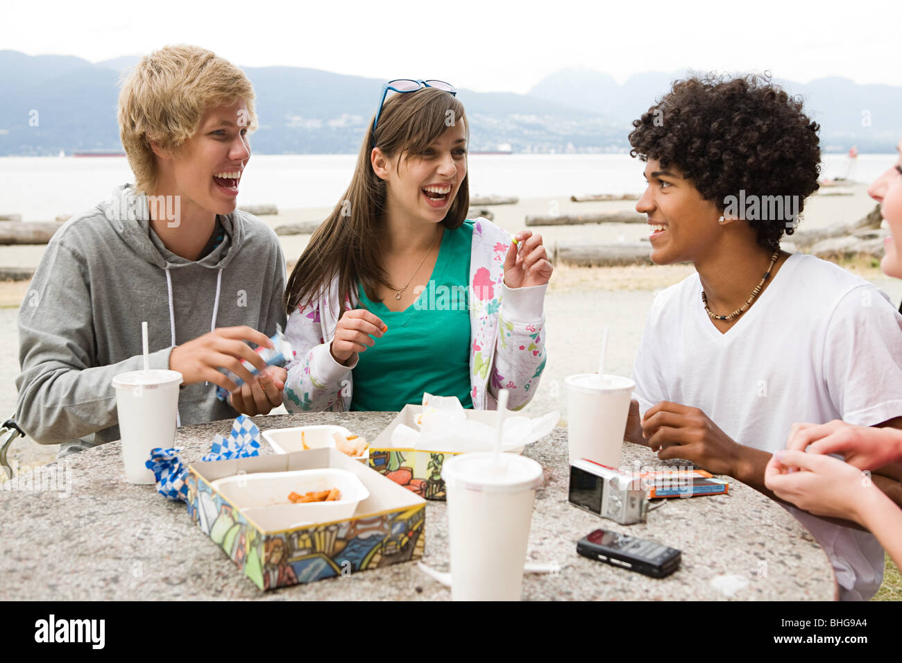 Teenagers with fast food Stock Photo - Alamy