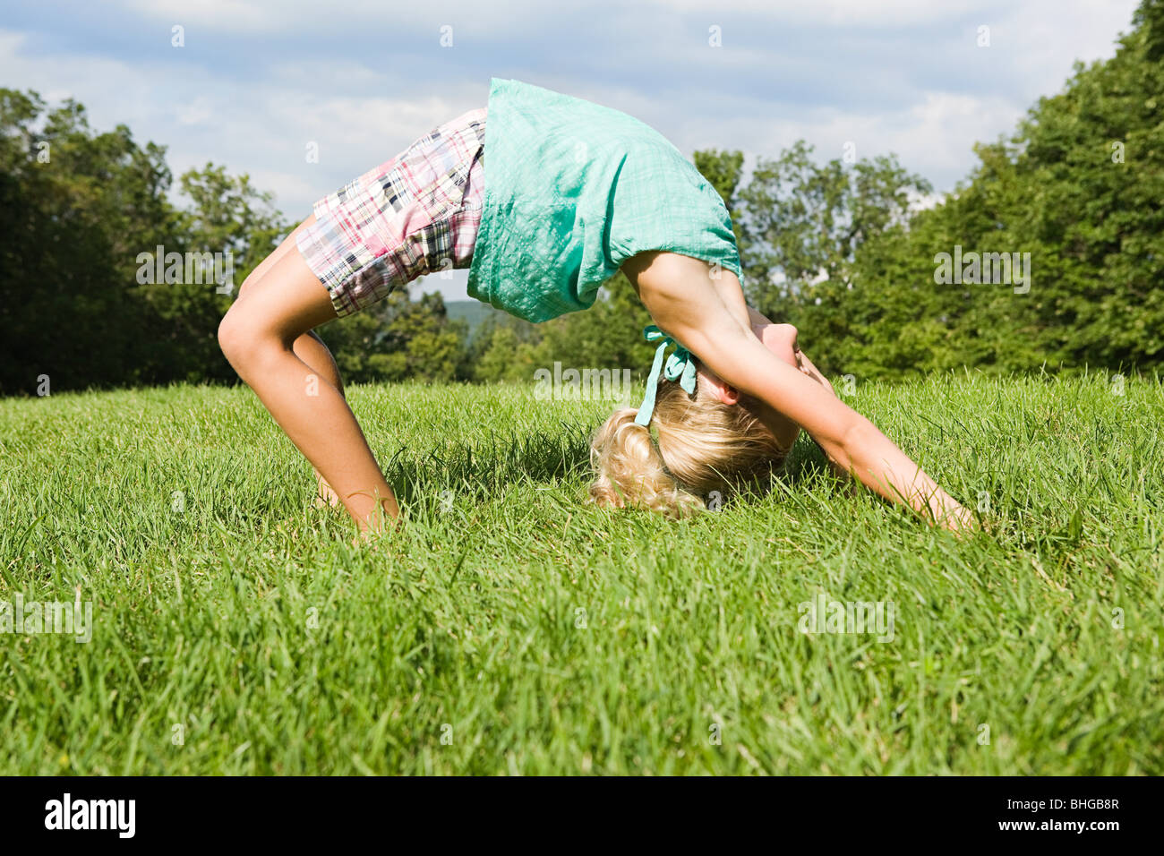 Girl bending over backwards Stock Photo - Alamy