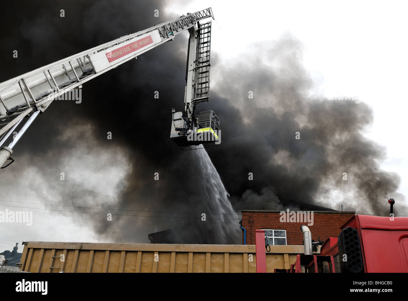 Fire at industrial factory unit with Hydraulic Platform Stock Photo - Alamy