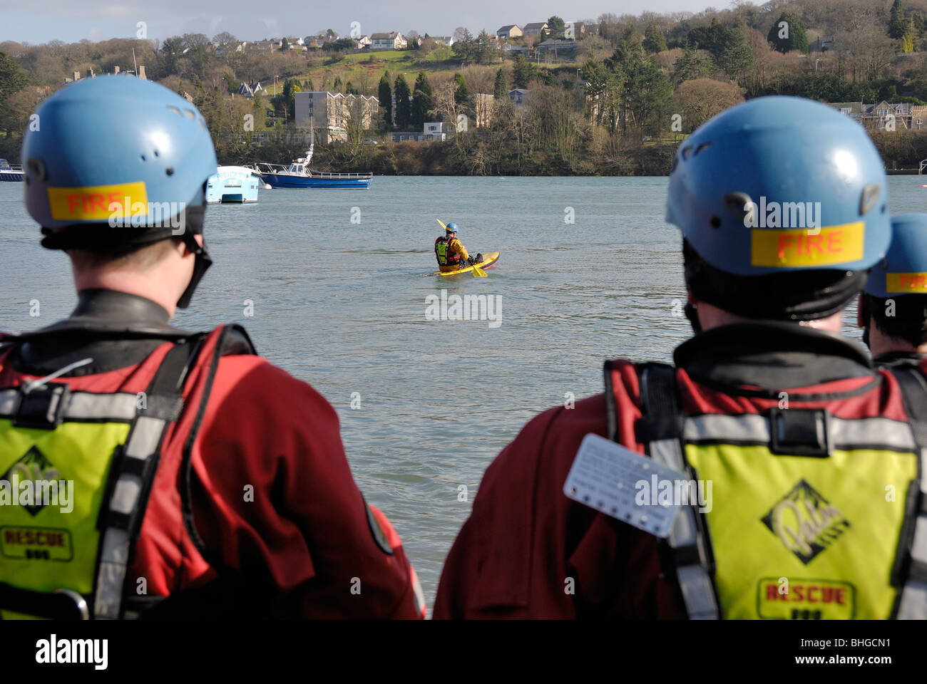 Firefighter practicing water rescue techniques Stock Photo - Alamy