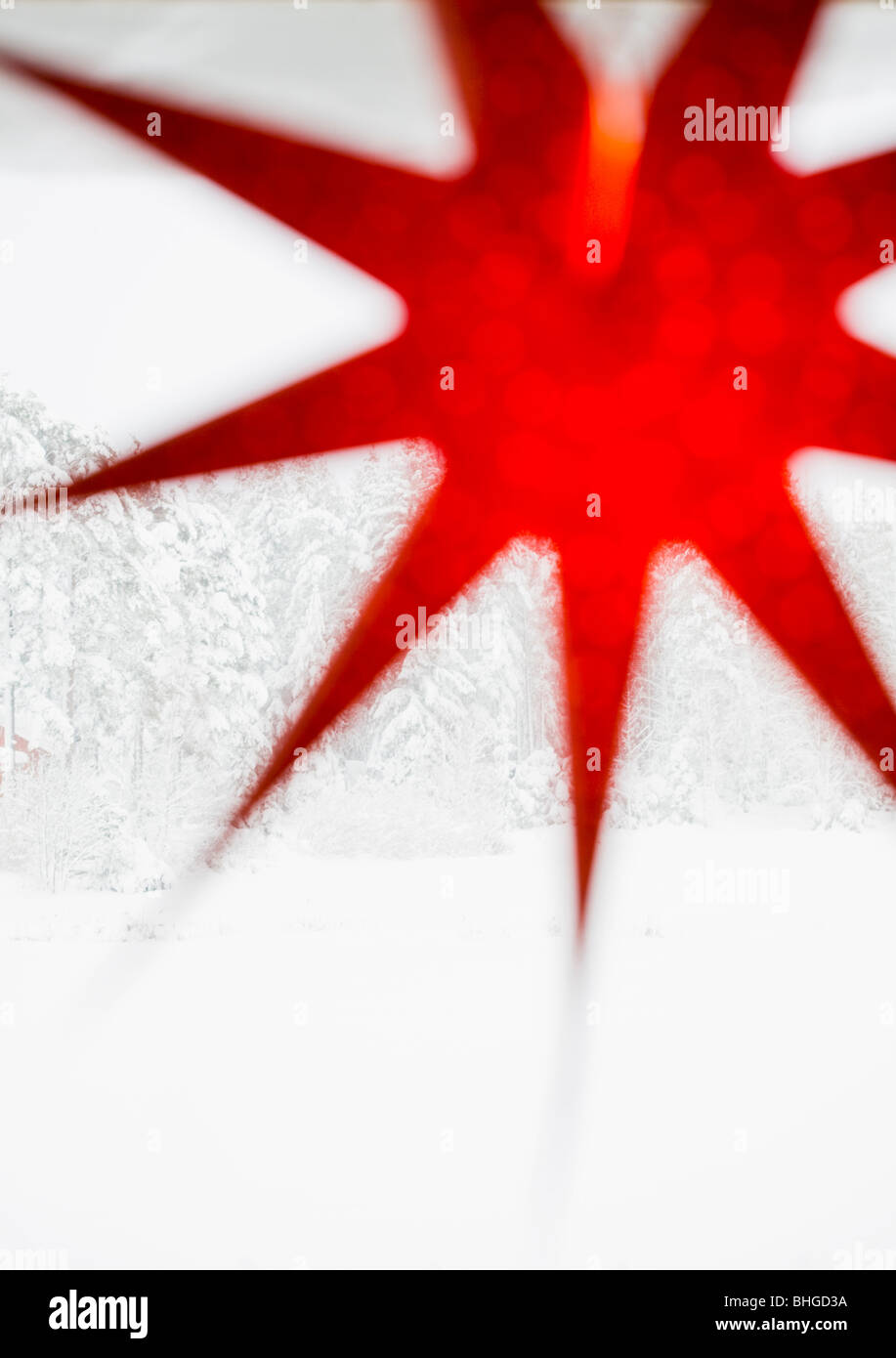 A red advent star in a window, Sweden Stock Photo - Alamy