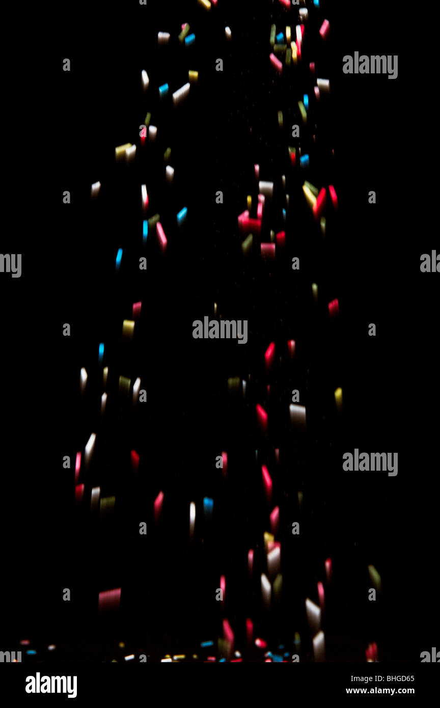 Colored sprinkle falling Stock Photo - Alamy