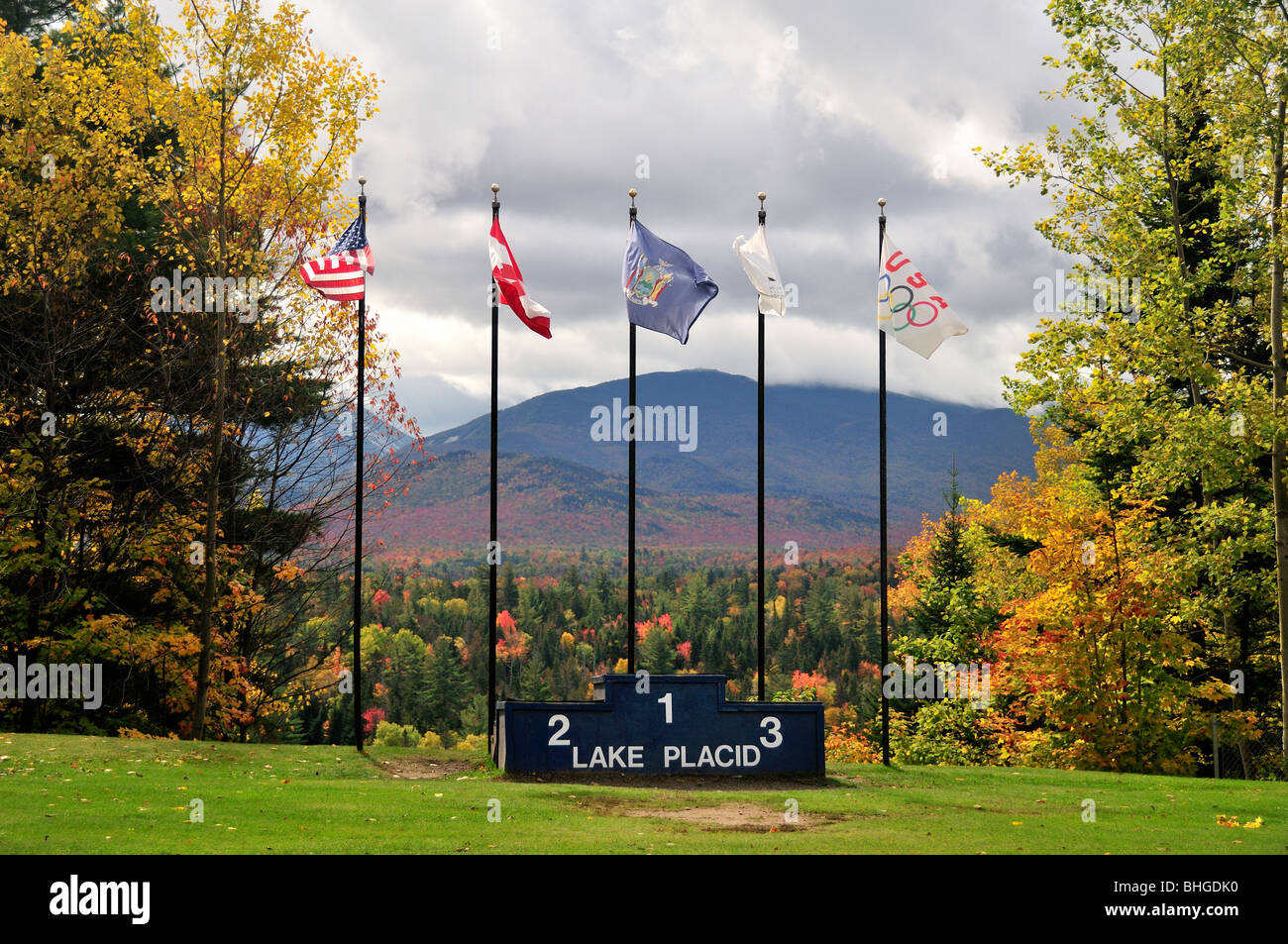 Five flags flying on poles near the Olympic ski jump complex at Lake ...