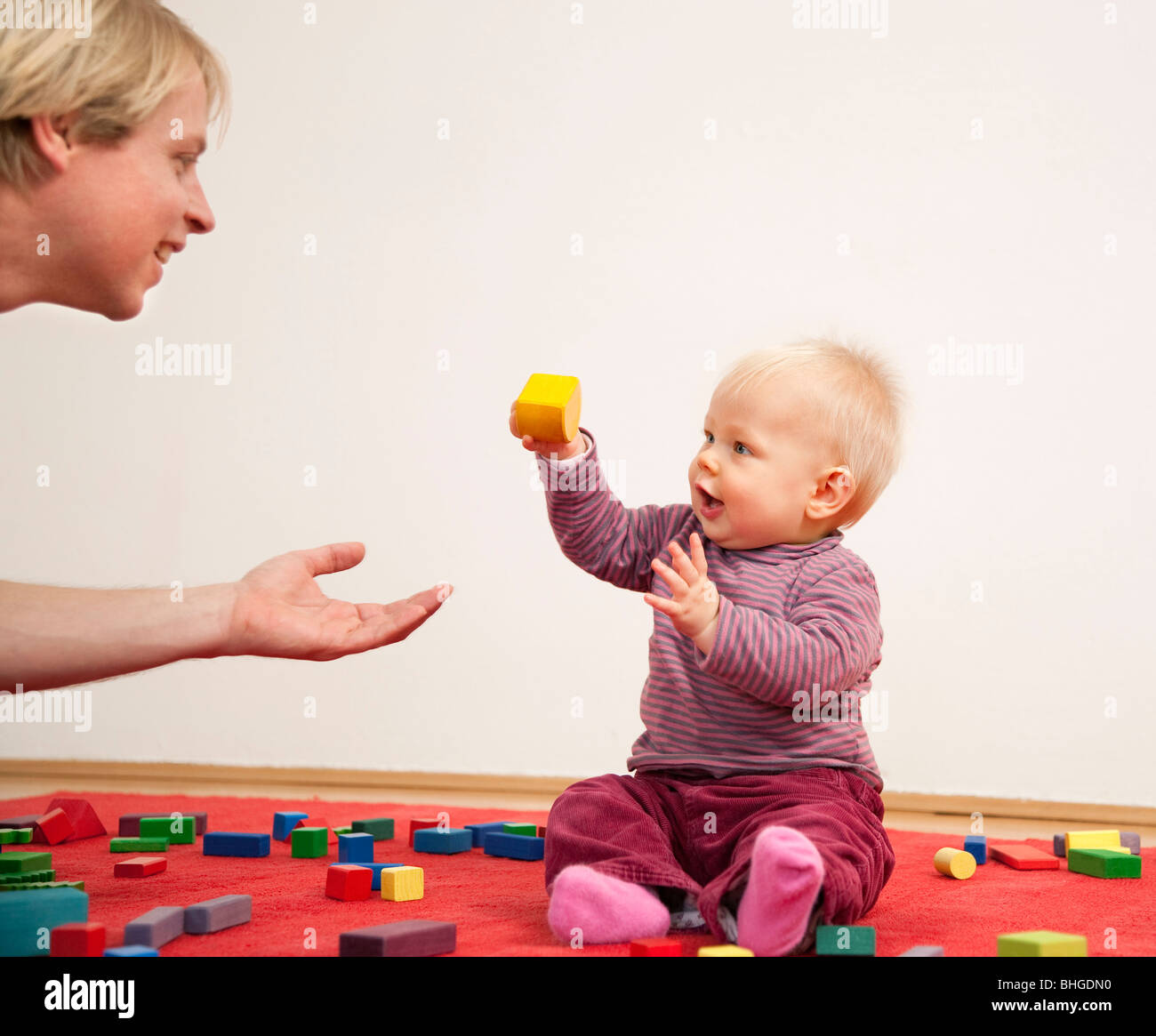 father and baby playing together Stock Photo - Alamy
