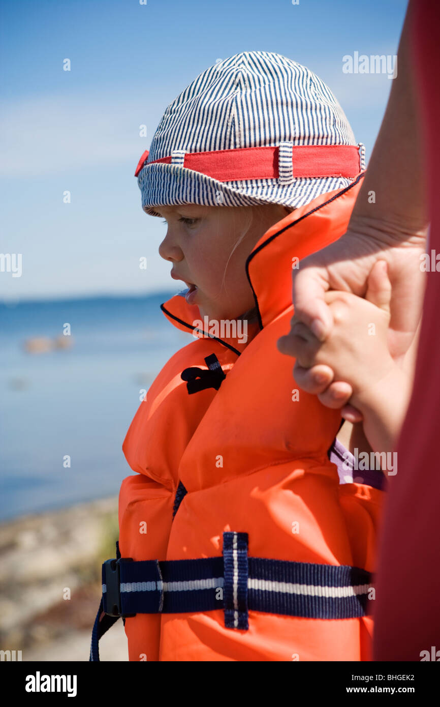 Child wearing life jacket hi-res stock photography and images - Alamy