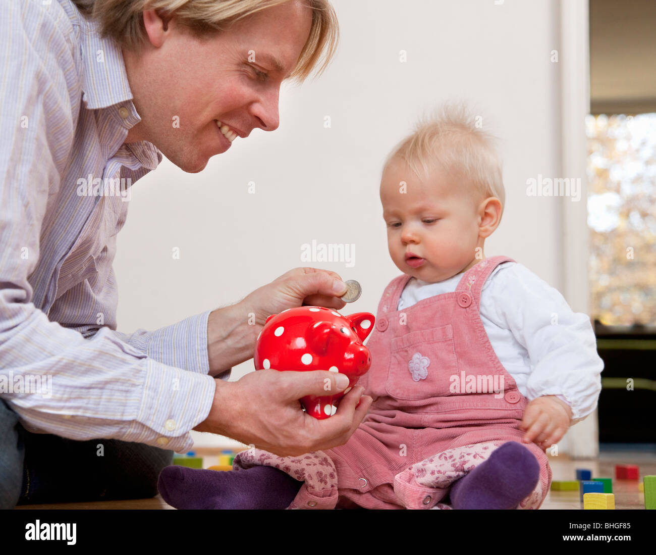 Father educating baby hi-res stock photography and images - Alamy