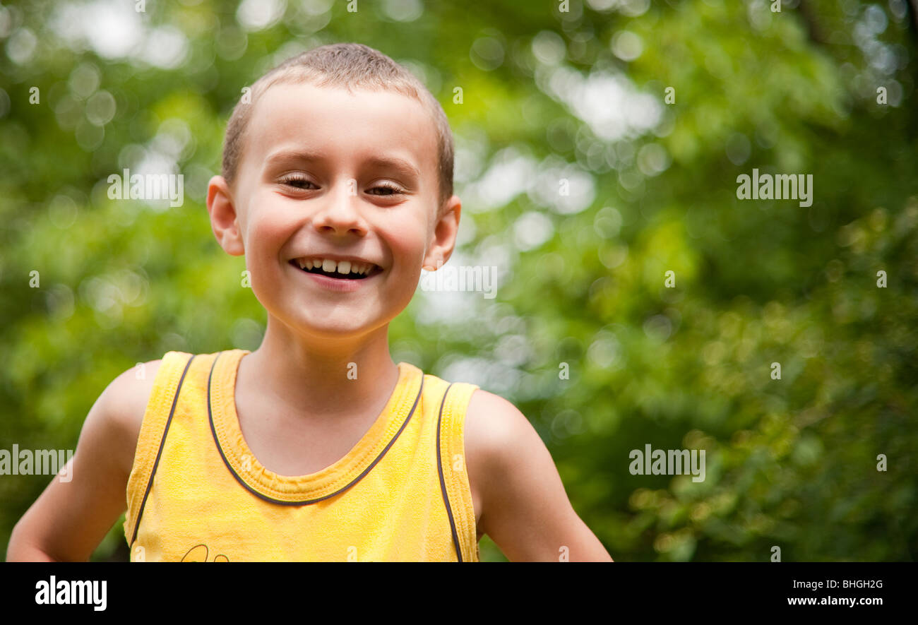 Cute kid having fun outdoors Stock Photo - Alamy