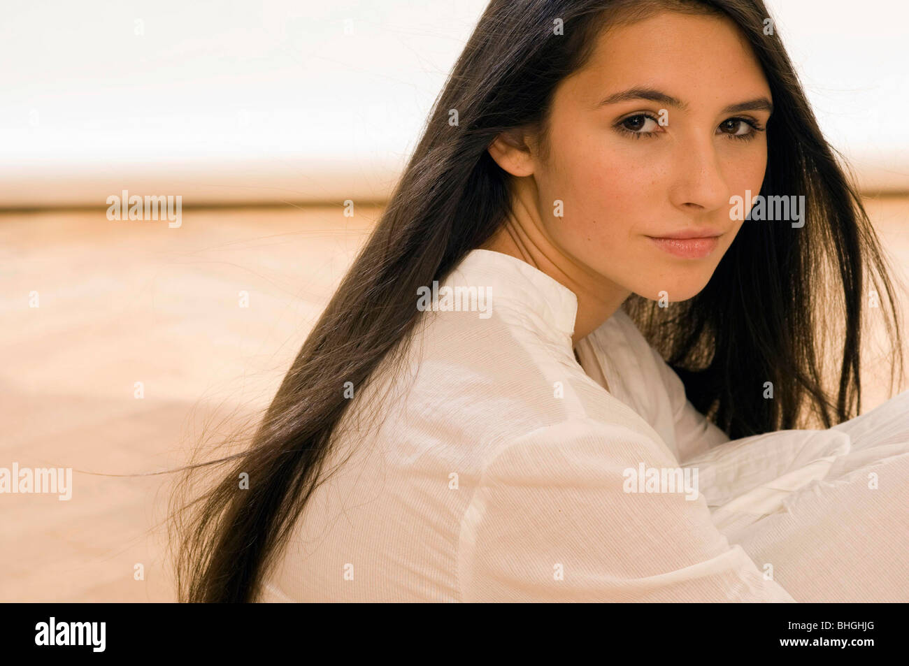 girl looking into camera Stock Photo - Alamy