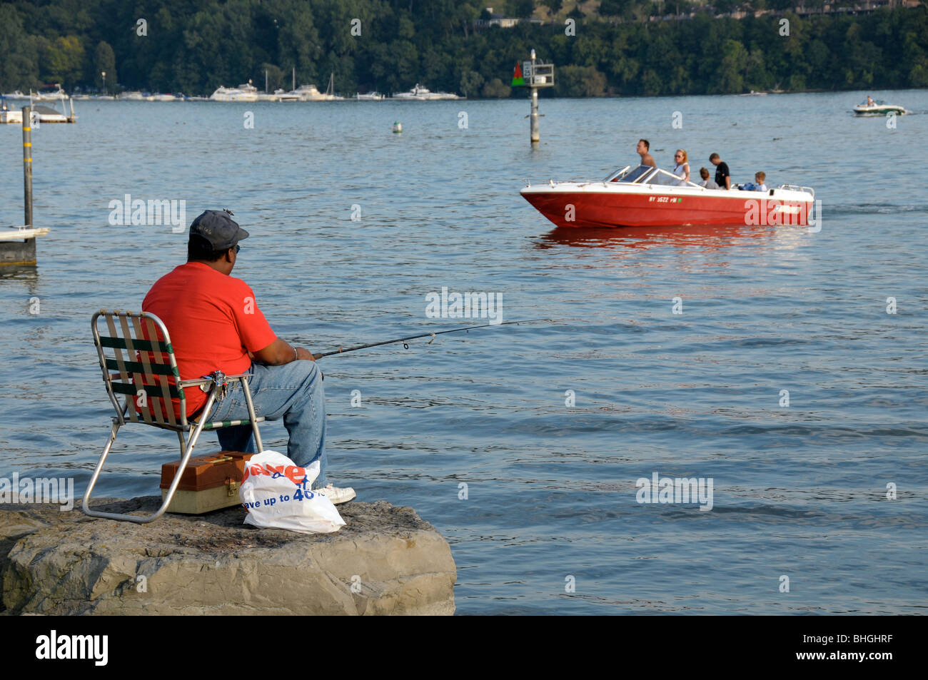 Man fishing on Irondequoit Bay, NY USA Stock Photo - Alamy
