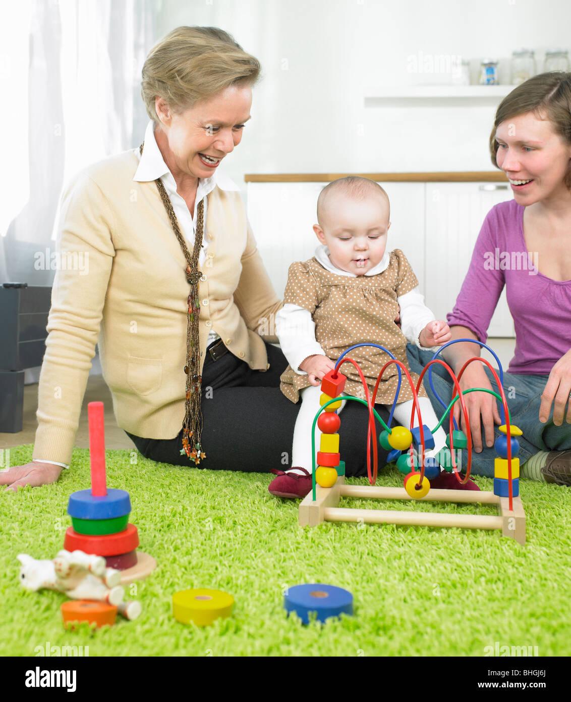 family playing together Stock Photo - Alamy
