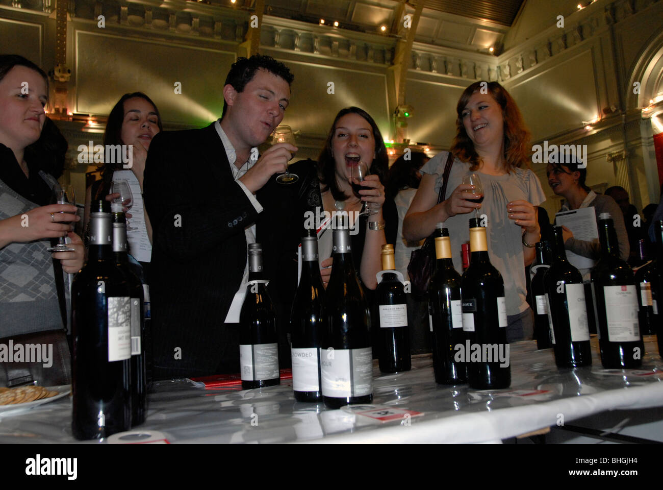Group wine tasting in evening Stock Photo - Alamy