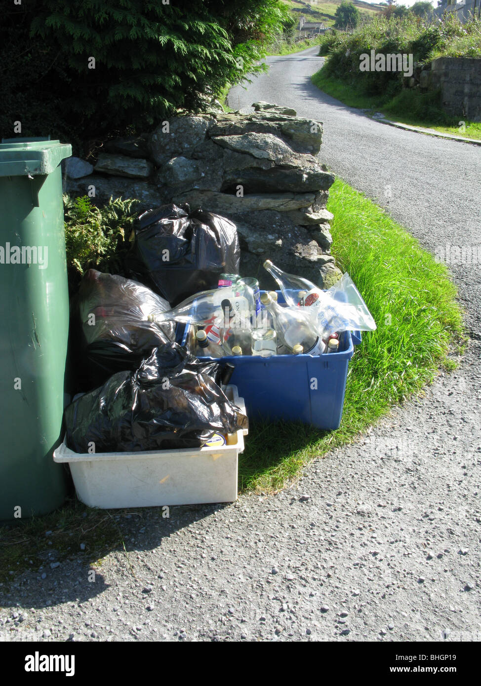 recycled household waste ready for collection outside home Stock Photo ...