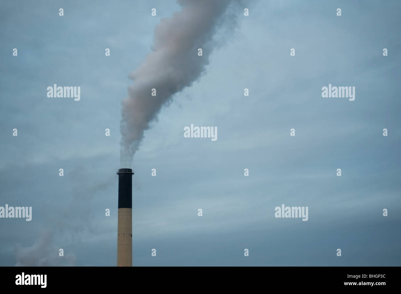 Industrial smoke stack pouring pollution into the air Stock Photo - Alamy