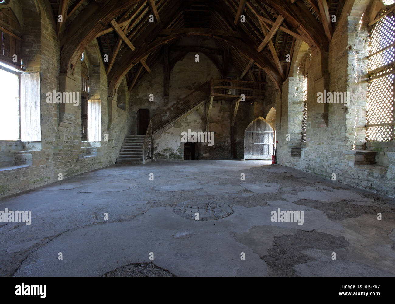 The interior of the open-hearthed great hall at Stokesay Castle in the ...