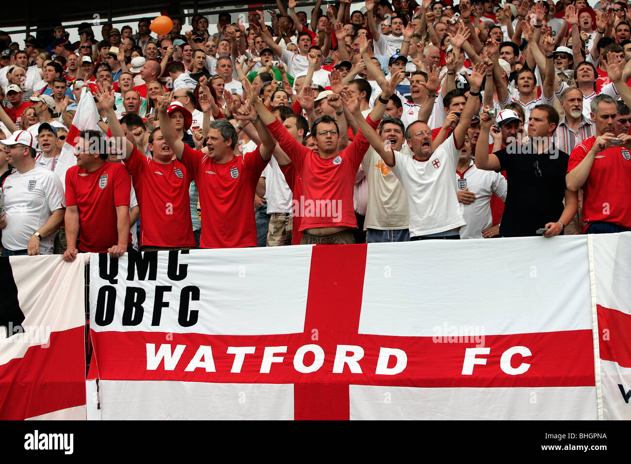 England fans with flags sing in the stands during the 2006 World Cup ...